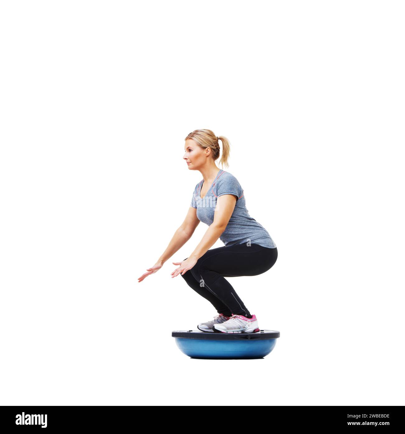 Woman, half ball or squat balance in studio workout performance ...