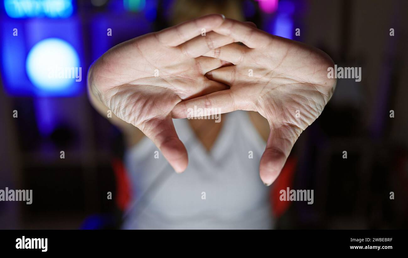 Gorgeous middle-aged blonde streamer woman rocking the gaming world ...