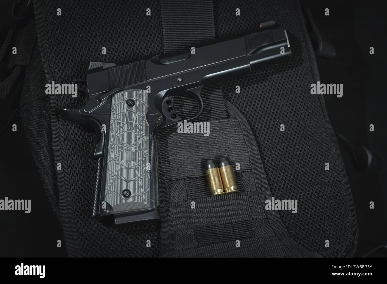 Beautiful M1911 45 caliber pistol and cartridges, close-up photo. High ...
