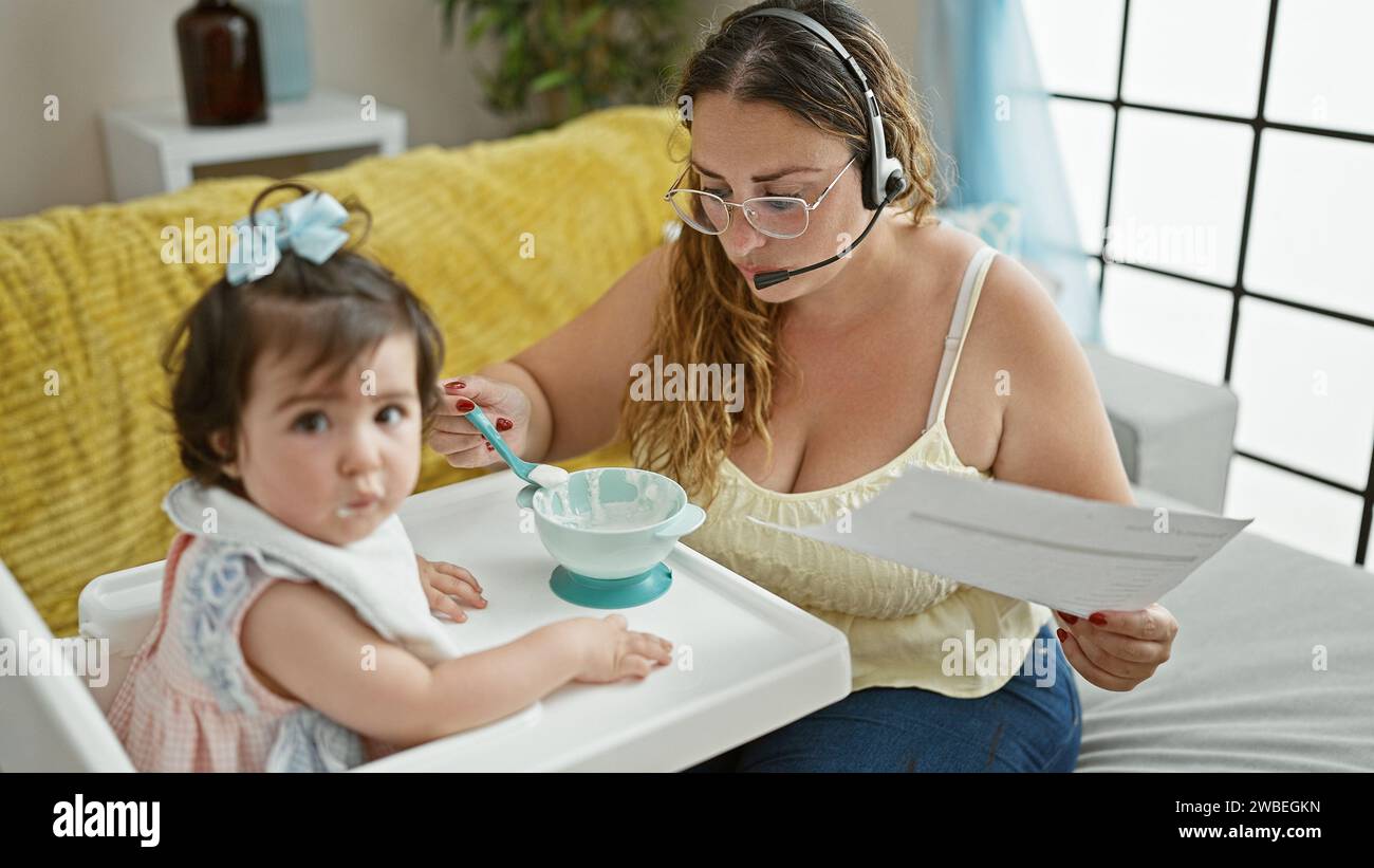 Working mum and daughter share a serious conversation during baby's ...