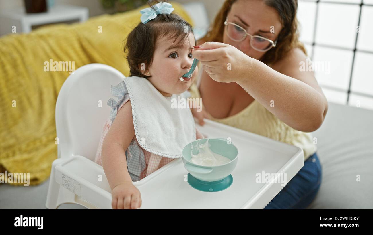 Mother and daughter together, loving family lifestyle, casually sitting ...