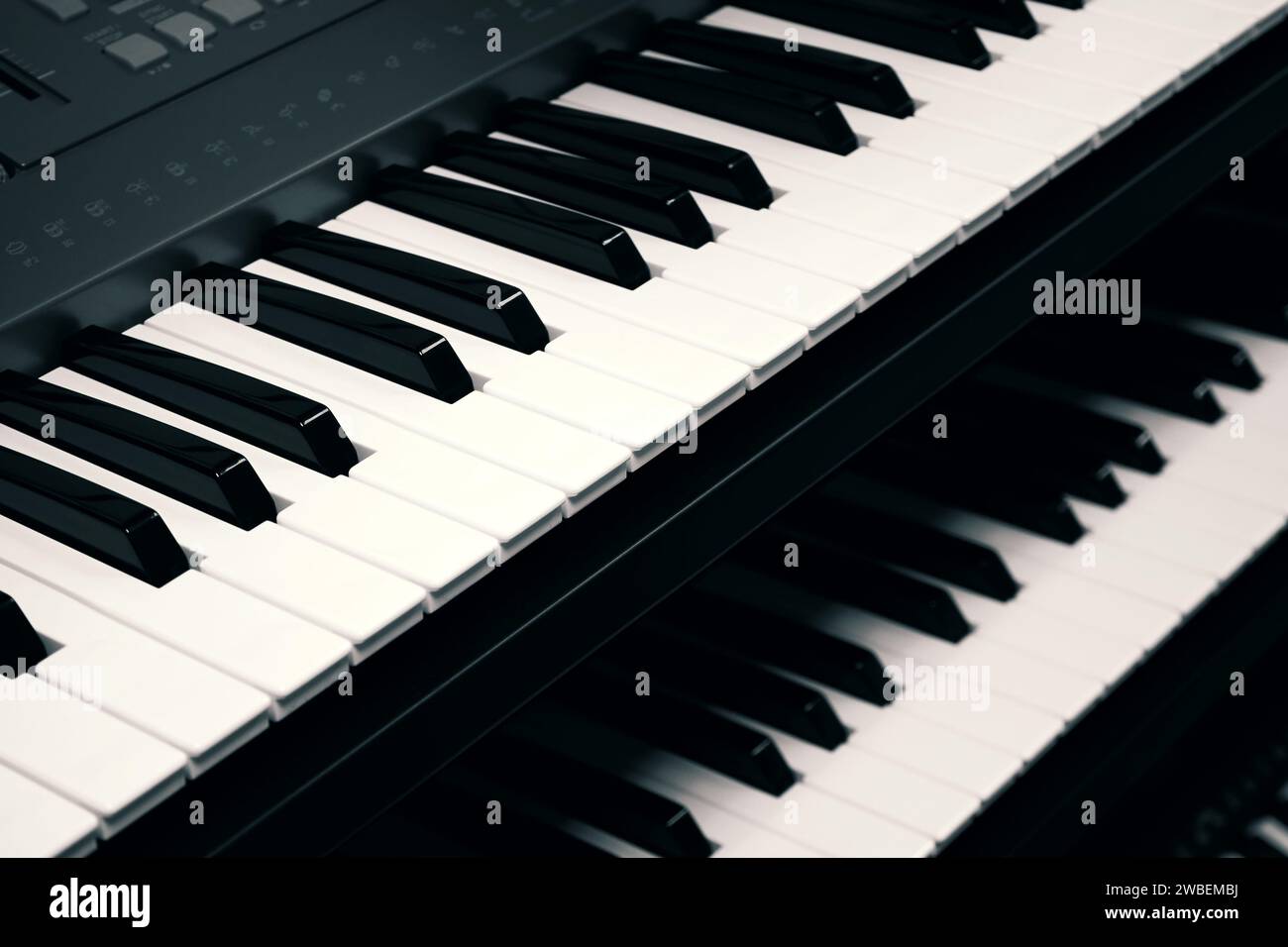 Digital piano keyboards close up, toned in black and white Stock Photo ...