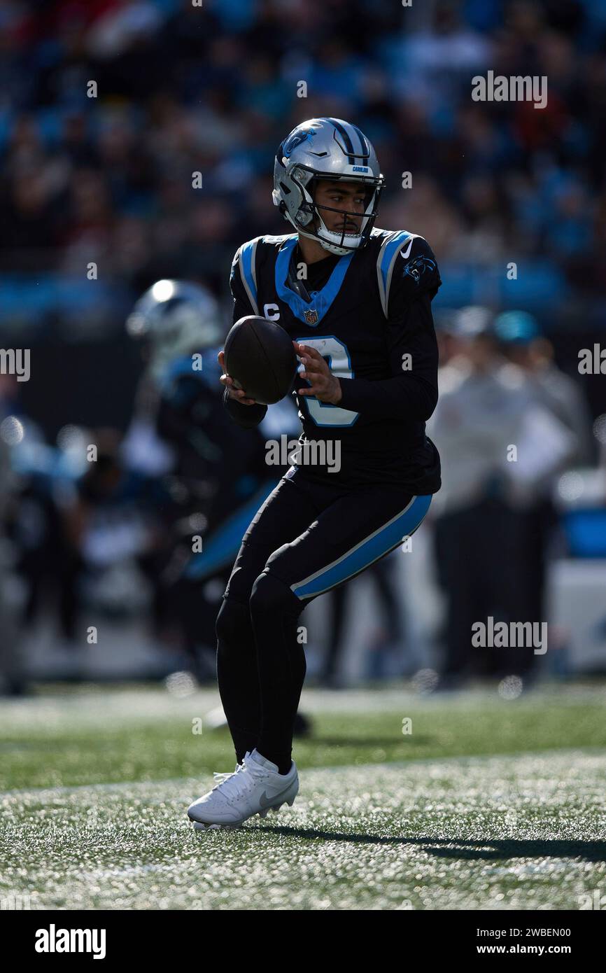 Carolina Panthers quarterback Bryce Young (9) turns to hand the ball ...