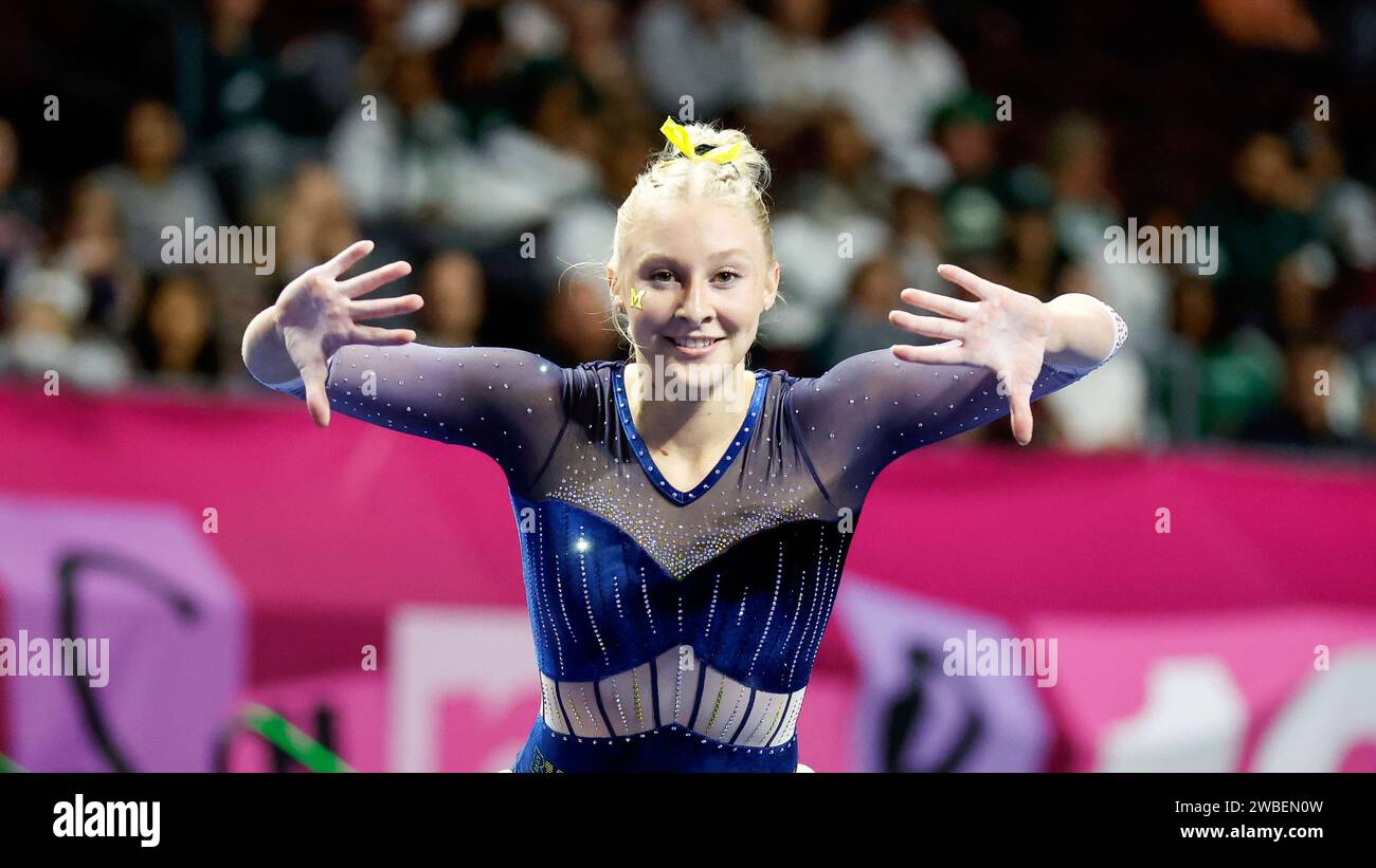 Michigan's Carly Bauman competes on the floor exercise during an NCAA ...
