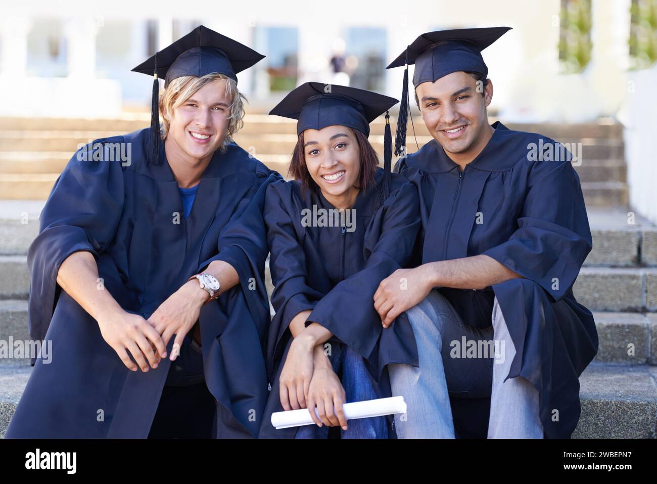 Graduation, portrait and students on steps with diploma at university ...