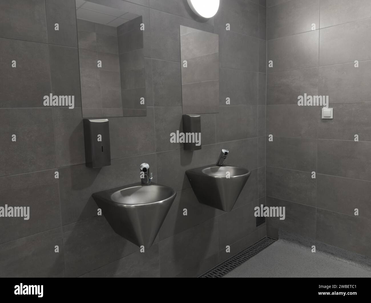 Modern stainless steel public toilet interior in the car park. Hand ...