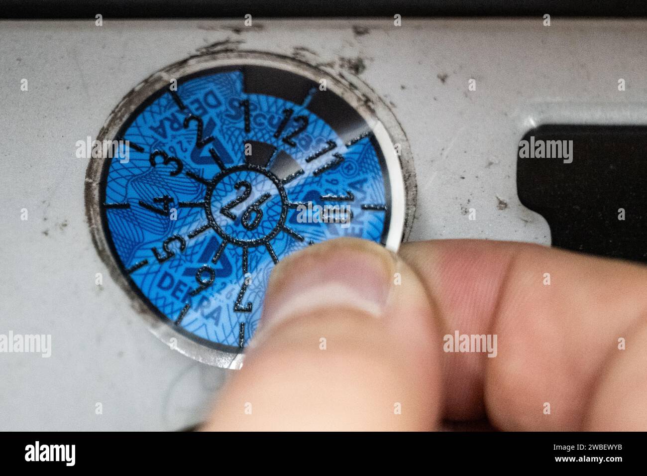 Stuttgart, Germany. 10th Jan, 2024. An employee of the testing ...