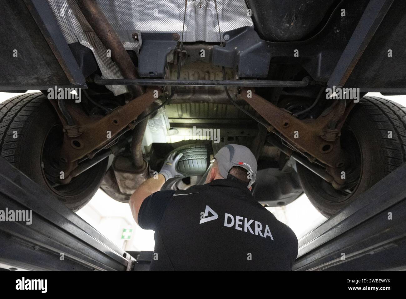 Stuttgart, Germany. 10th Jan, 2024. An employee of the testing ...