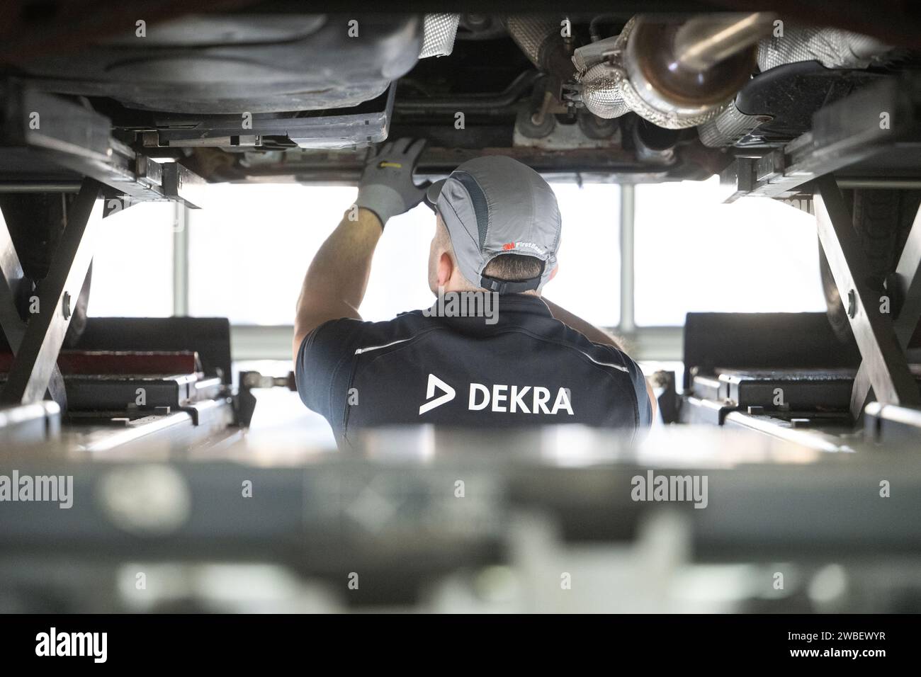 Stuttgart, Germany. 10th Jan, 2024. An employee of the testing ...