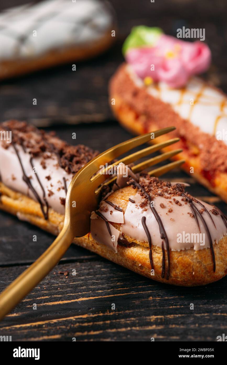 Beautiful delicious french eclairs set with original cream decor on ...