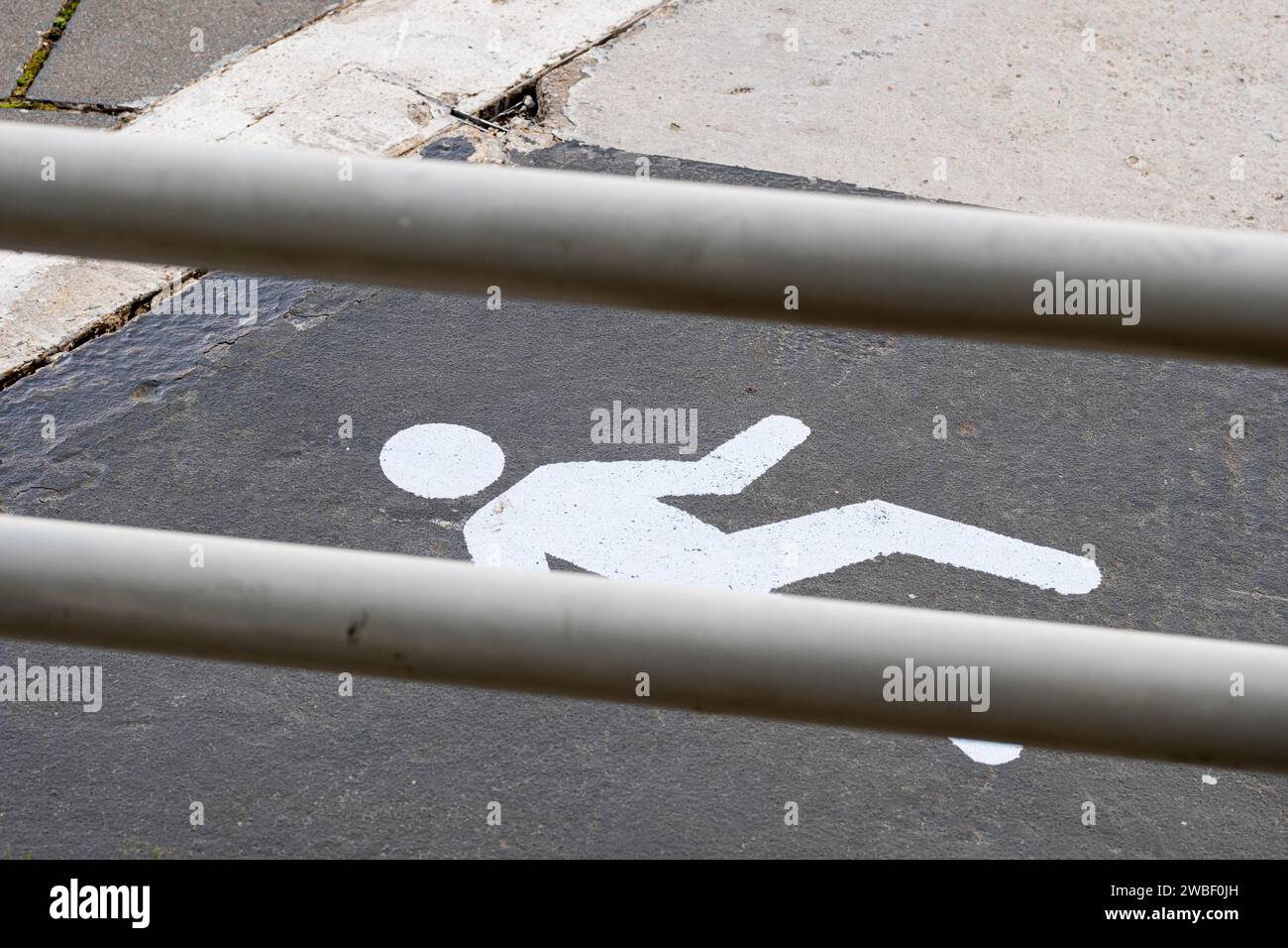 Pedestrian crossing symbol painted on a street Stock Photo - Alamy