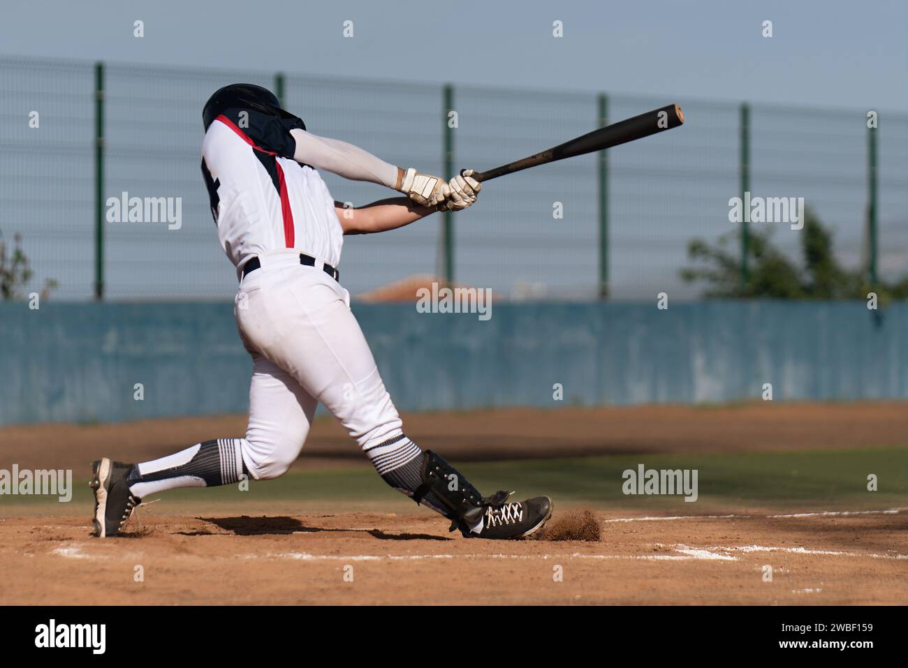 Baseball players in action on the stadium, baseball batter waiting to ...