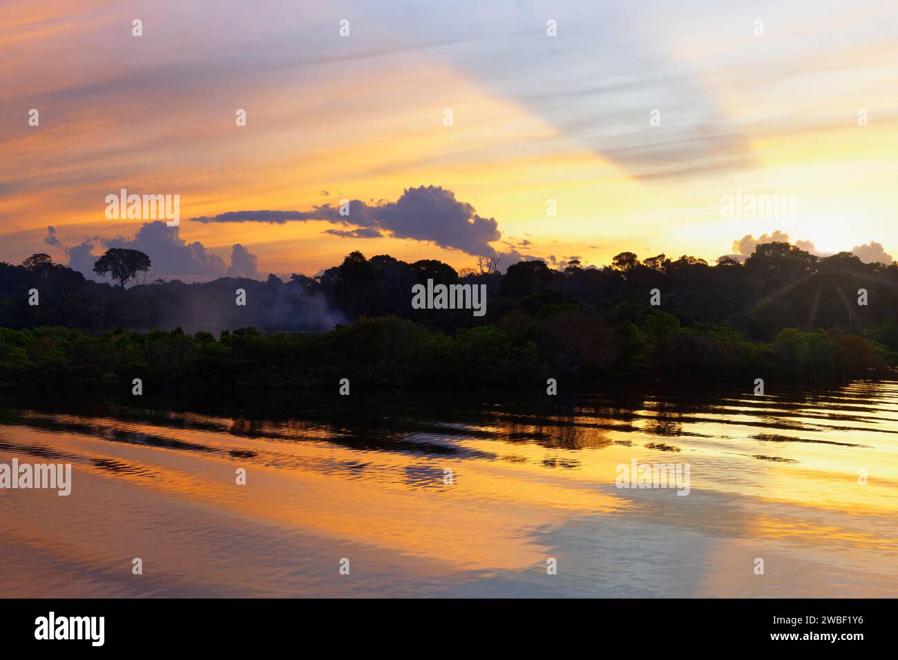 Sunset on the Madeira River, an Amazon tributary, Amazonas state ...