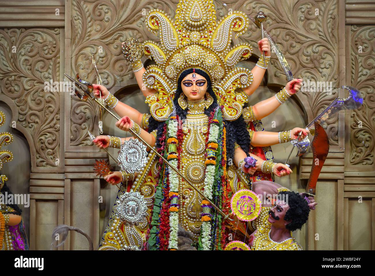 Idol of Goddess Devi Durga at a decorated puja pandal in Kolkata, West ...