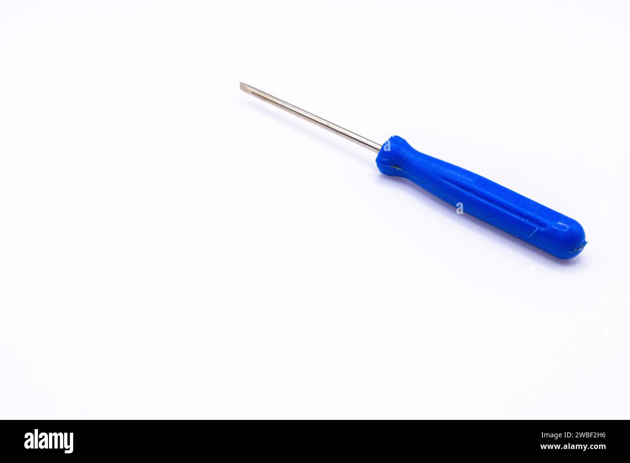 Blue flathead screwdriver on white background Stock Photo - Alamy