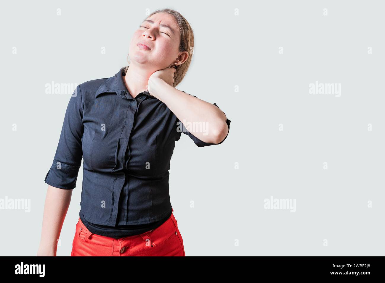 Young woman with muscle tension and neck pain isolated. Stress and neck ...