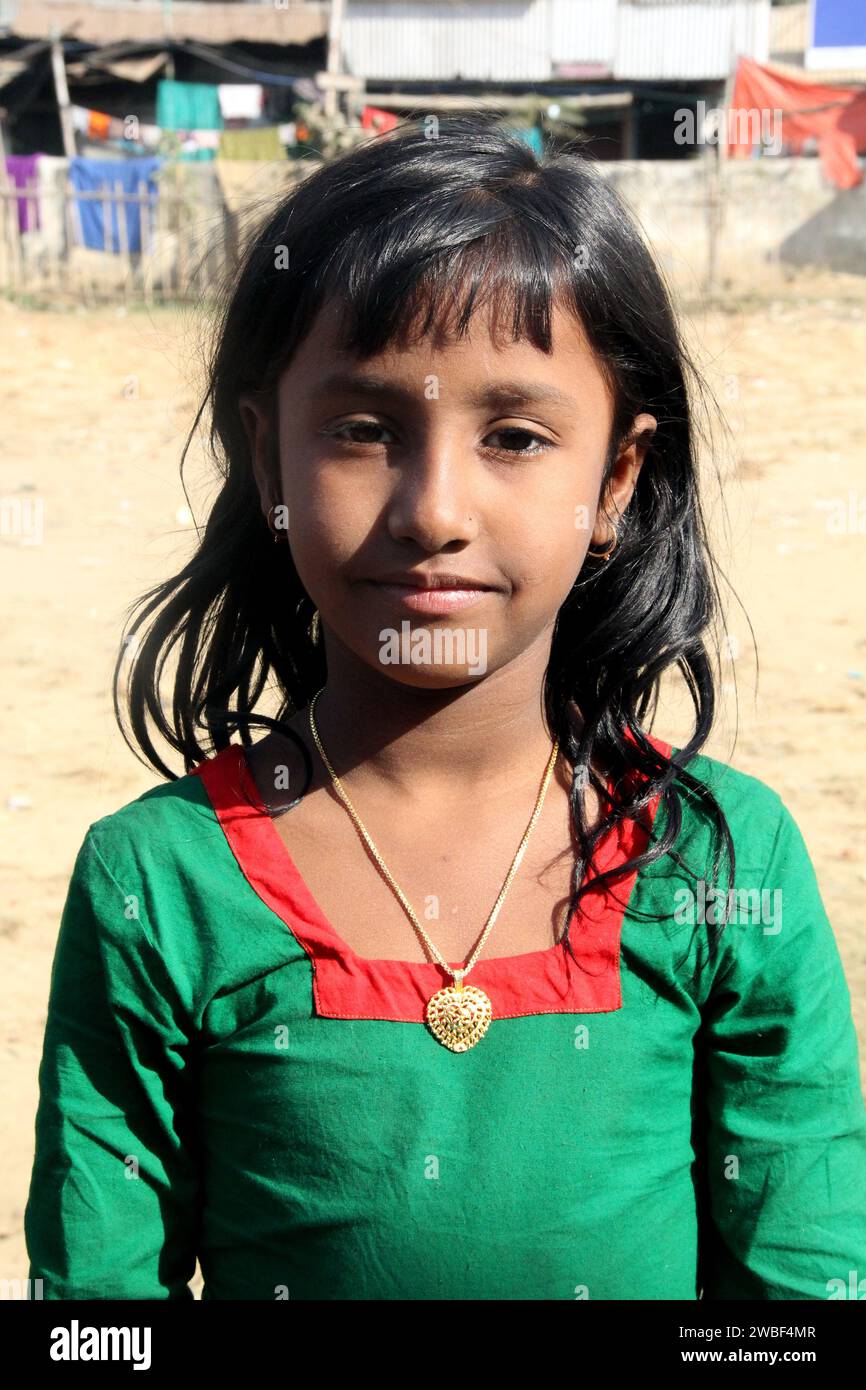Portrait of a little girl in the slums of Rayer bazar. Bangladesh Stock ...