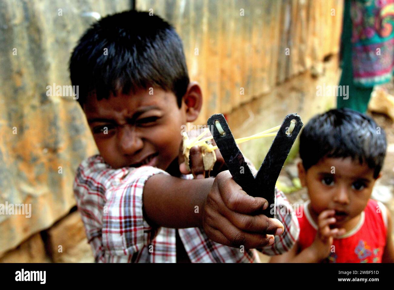 Portrait of a boy in the slums of Rayer bazar. Bangladesh Stock Photo ...