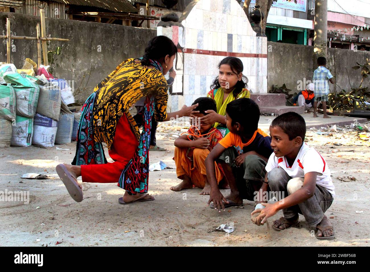 Children playing in the slums of Rayer bazar. Bangladesh Stock Photo ...