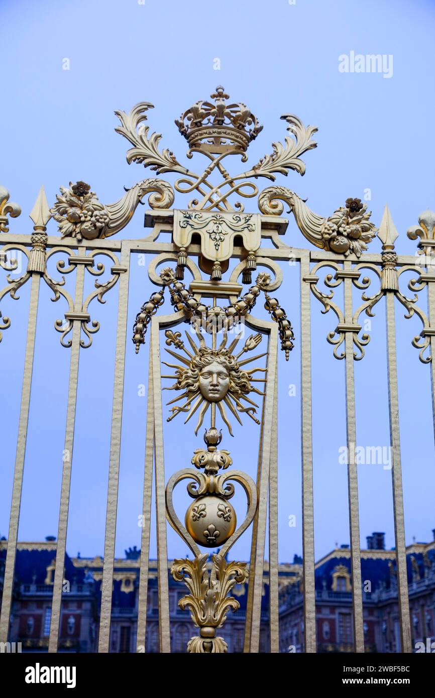 Emblem of the Sun King with Apollo's head, sunbeams and sceptre with ...
