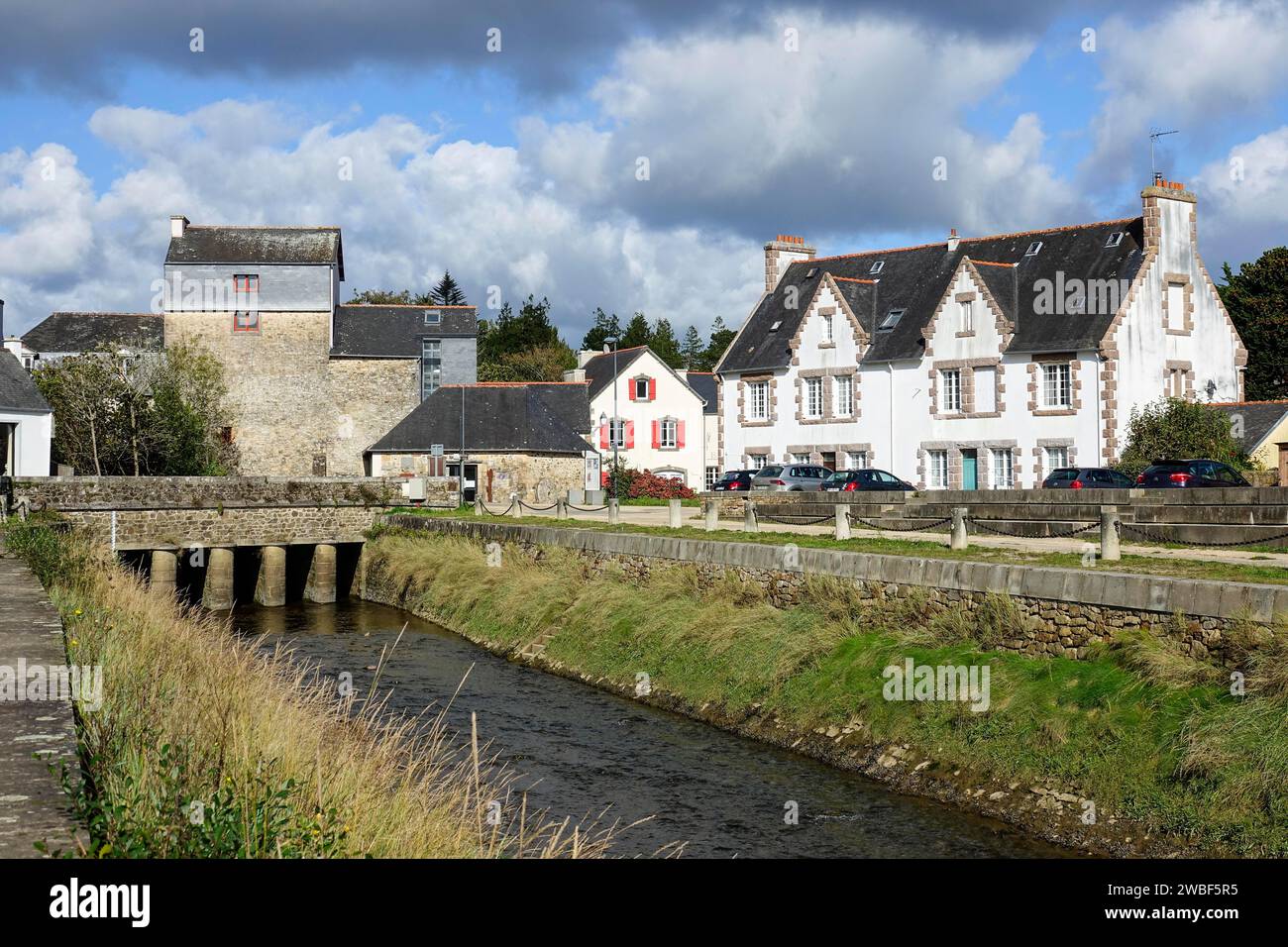 Bridge with Moulin du Pont mill at the mouth of La Mignonne into the ...