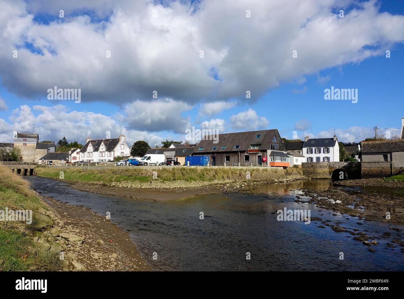 Bridge with Moulin du Pont mill at the mouth of La Mignonne into the ...