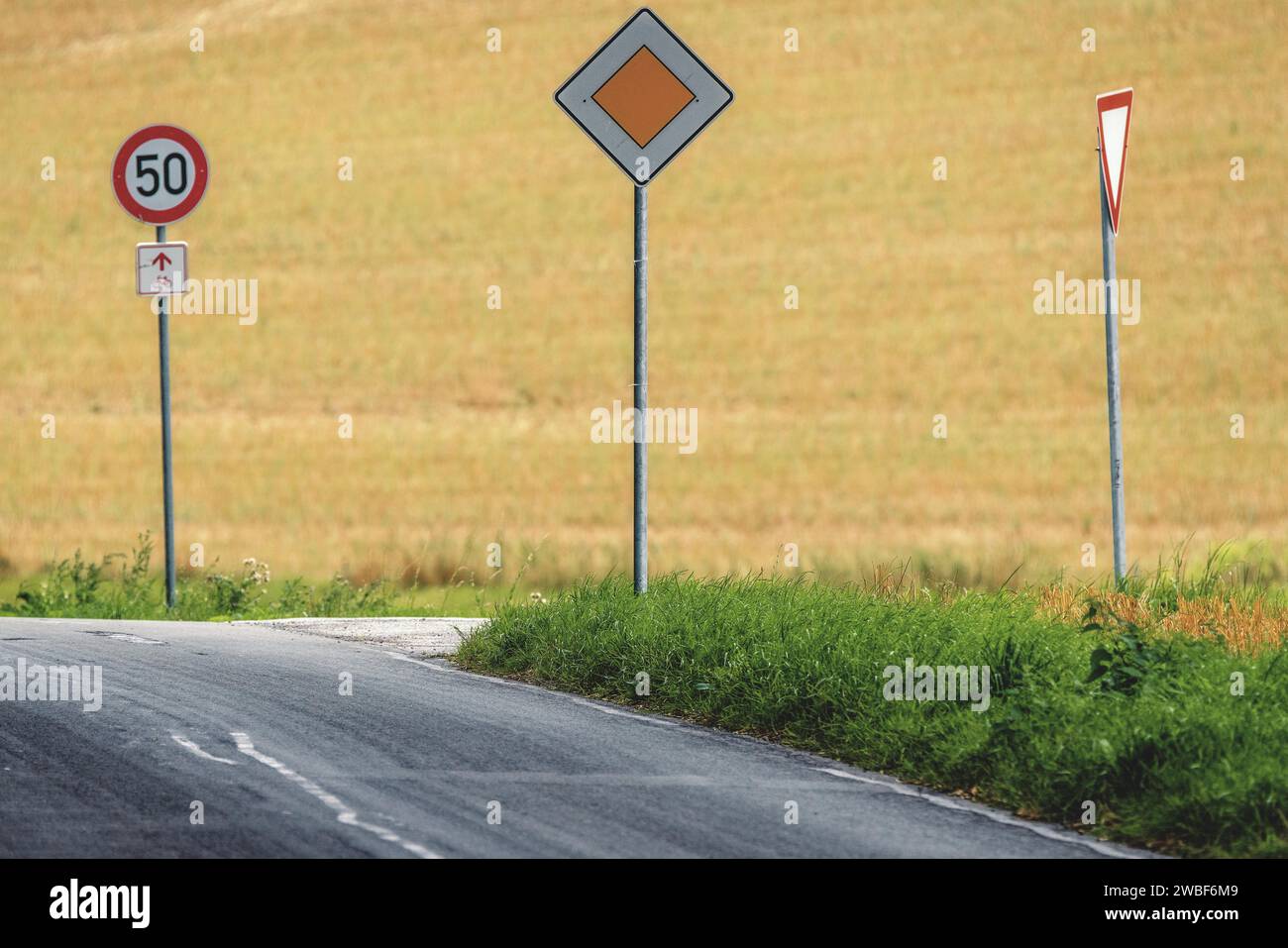 Traffic signs on a rural road with speed limit, Osterholz, Wuppertal ...