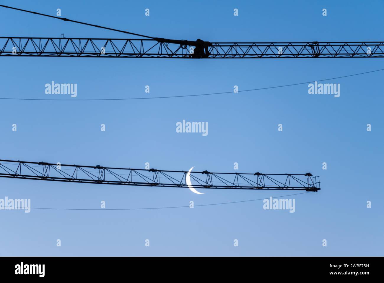 Crane with moon hi-res stock photography and images - Alamy
