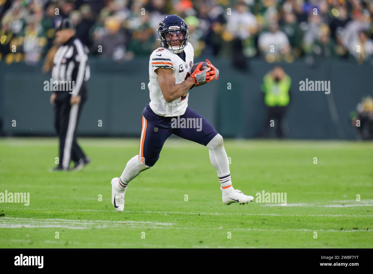 Chicago Bears wide receiver DJ Moore (2) runs after making a catch during an NFL football game ...