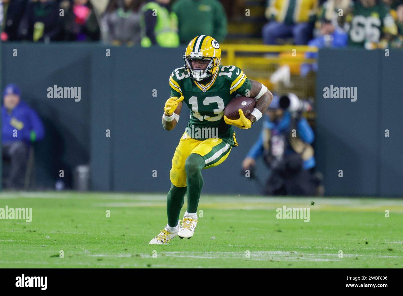 Green Bay Packers wide receiver Dontayvion Wicks (13) runs during an ...