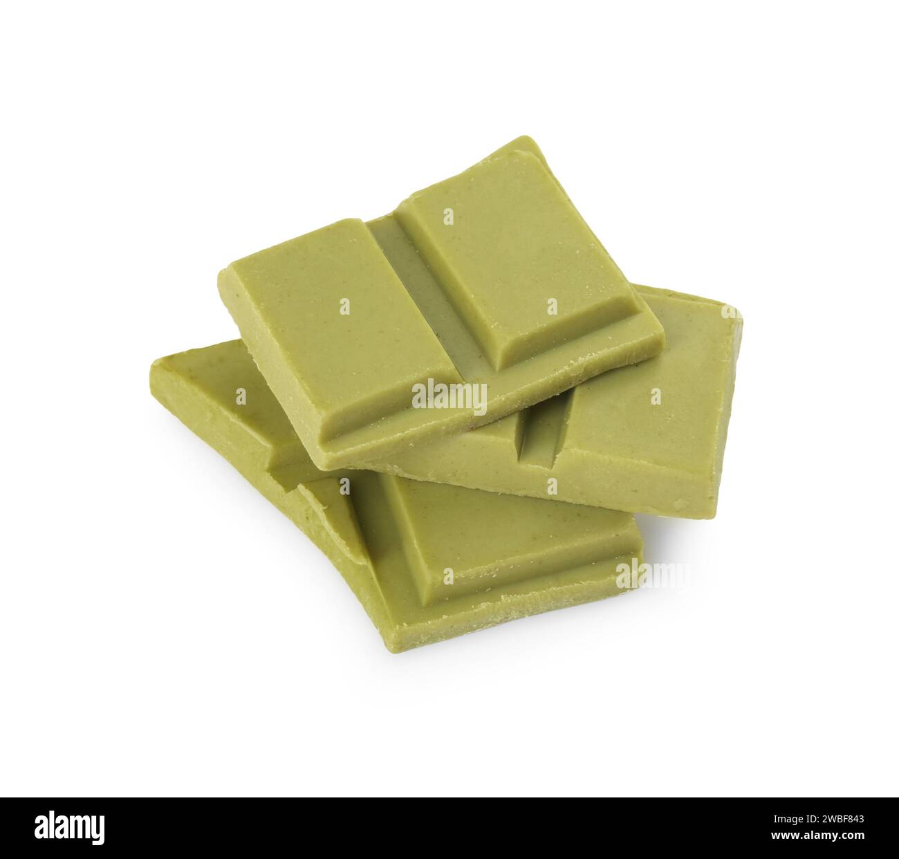 Pieces of tasty matcha chocolate bar isolated on white Stock Photo - Alamy