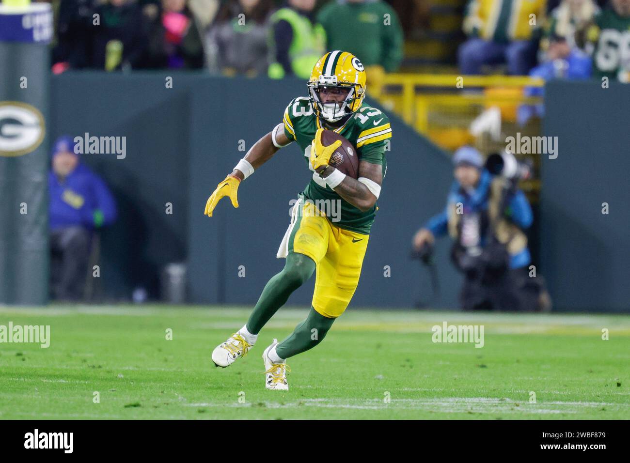Green Bay Packers wide receiver Dontayvion Wicks (13) runs during an ...