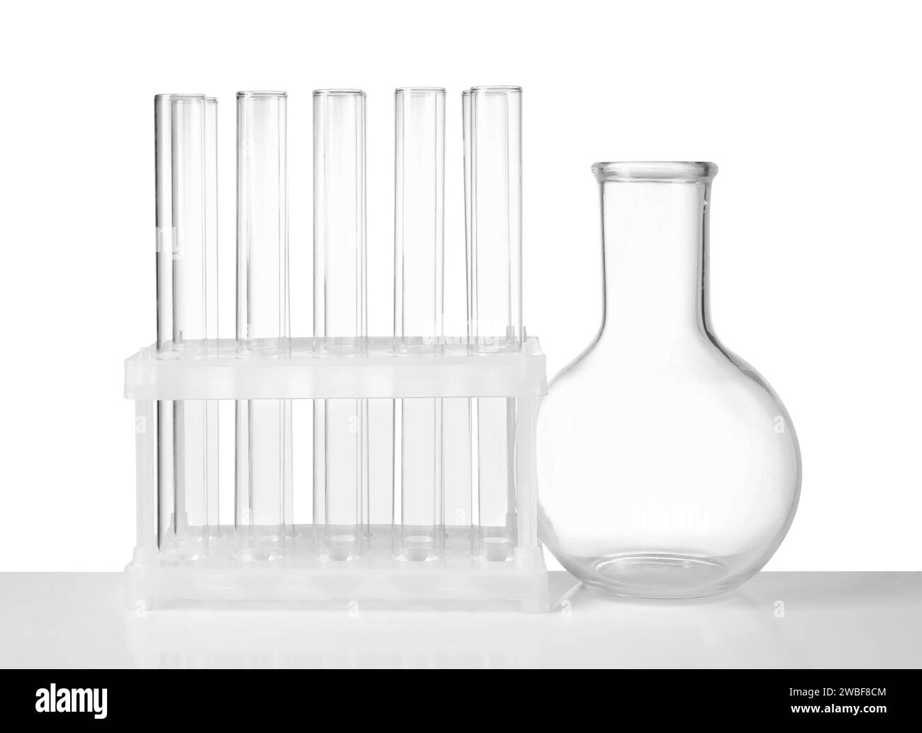 Empty laboratory flask and test tubes isolated on white Stock Photo - Alamy