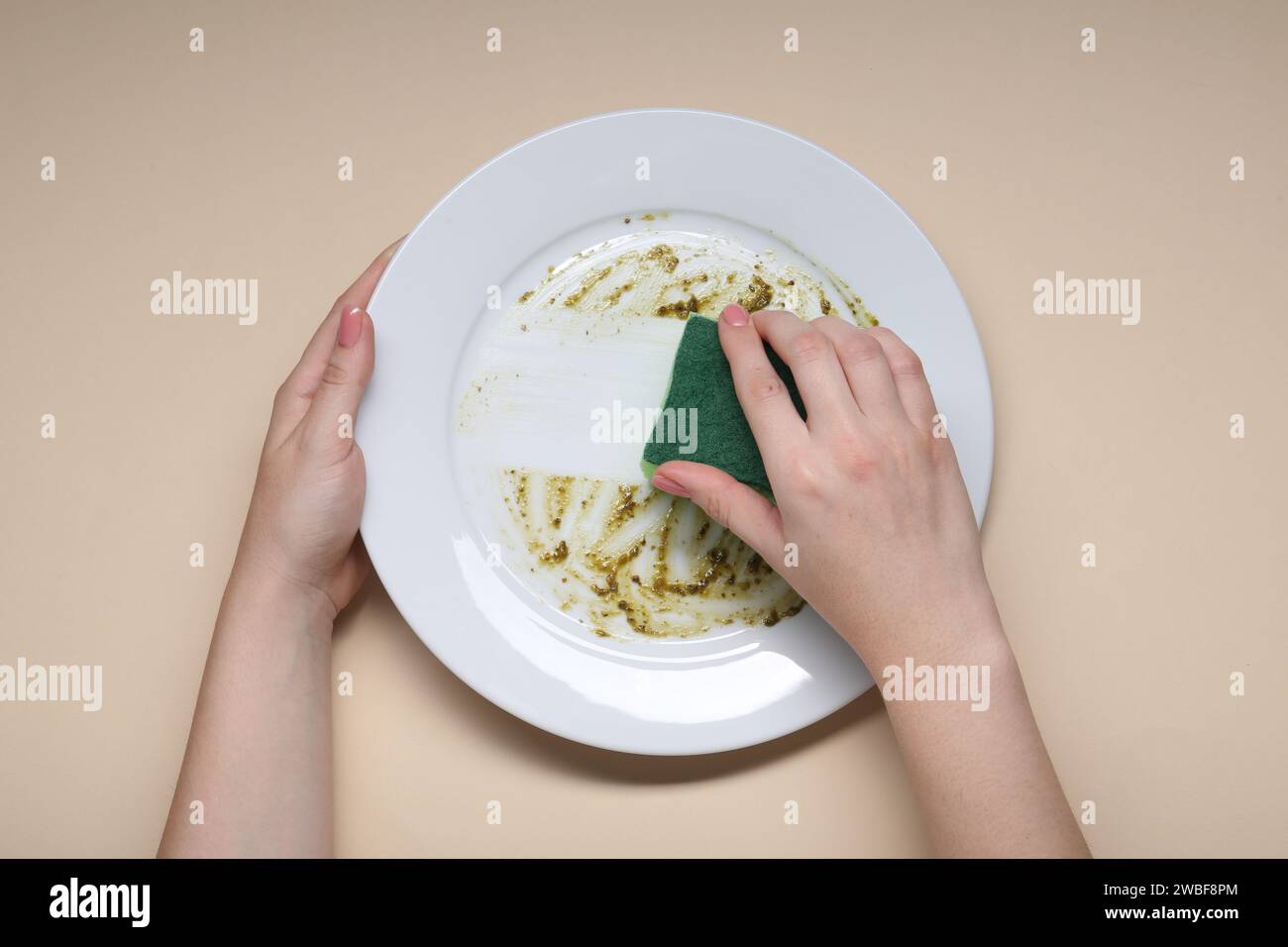 Woman smeared plate hi-res stock photography and images - Alamy