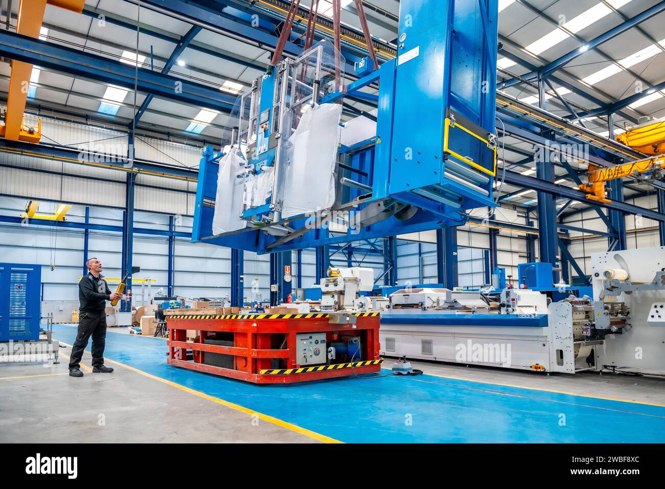 Horizontal photo with copy space of a crane lifting very heavy ...