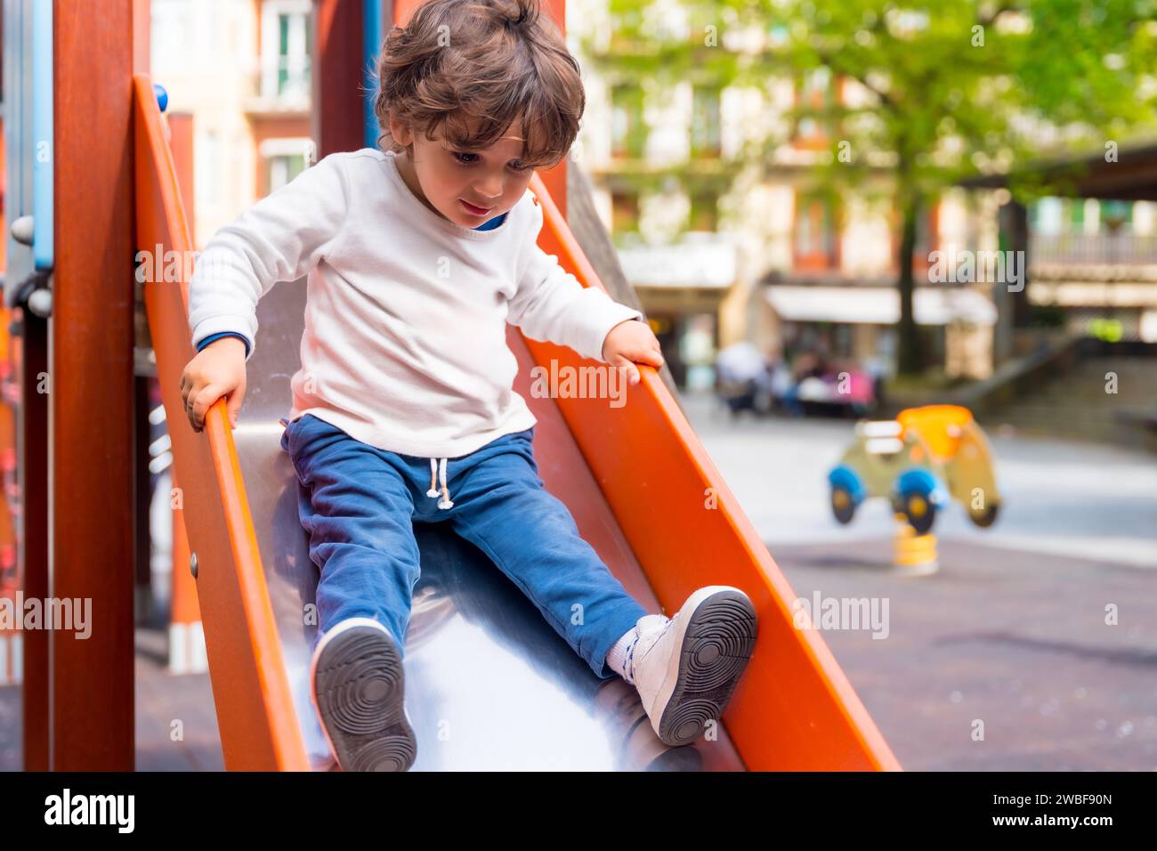 Woman sliding down hi-res stock photography and images - Alamy