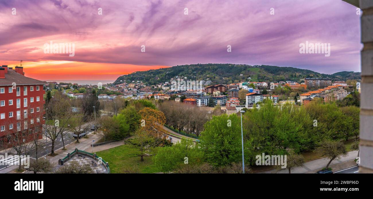 Panoramic sunset in Donostia San Sebastian from a high neighborhood and ...
