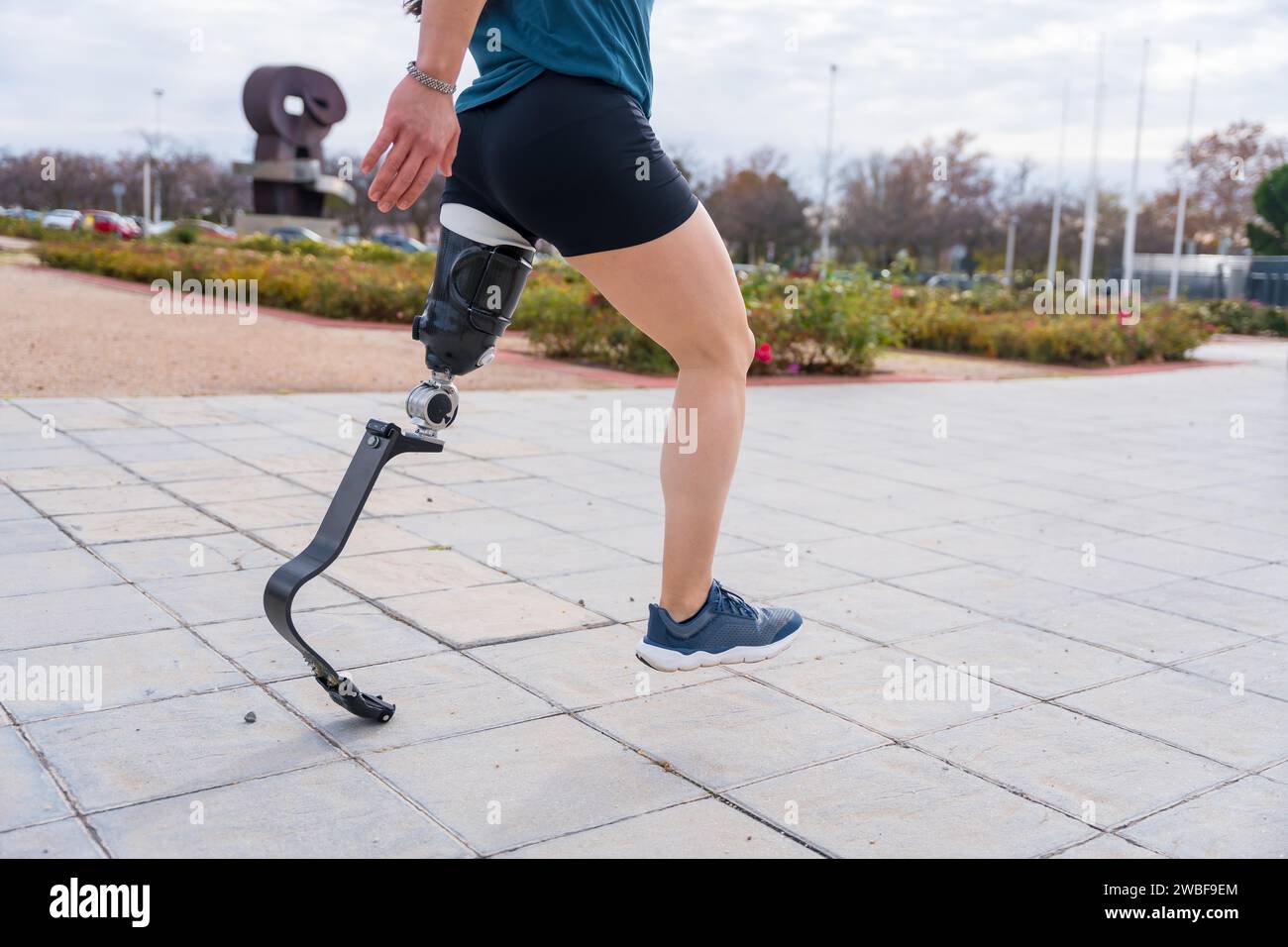 Cropped photo of an unrecognizable disabled person with prosthetic leg ...