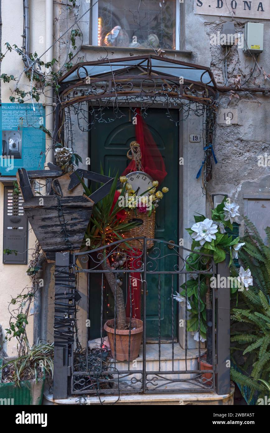 Decorated side entrance with large clock and bows at the Palazzo di ...