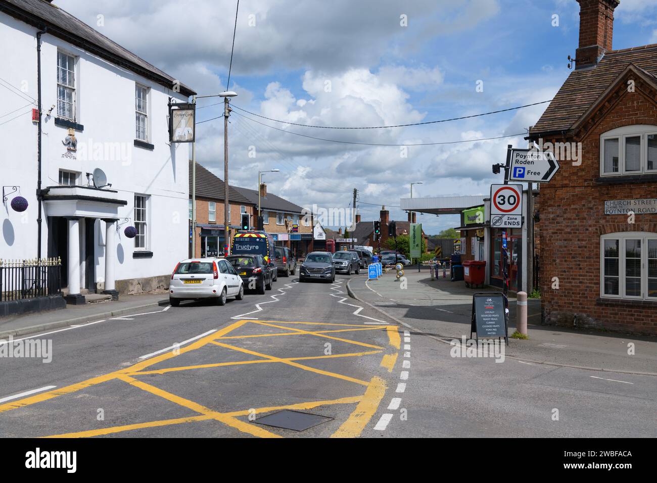 Busy road passing through small village hi-res stock photography and ...