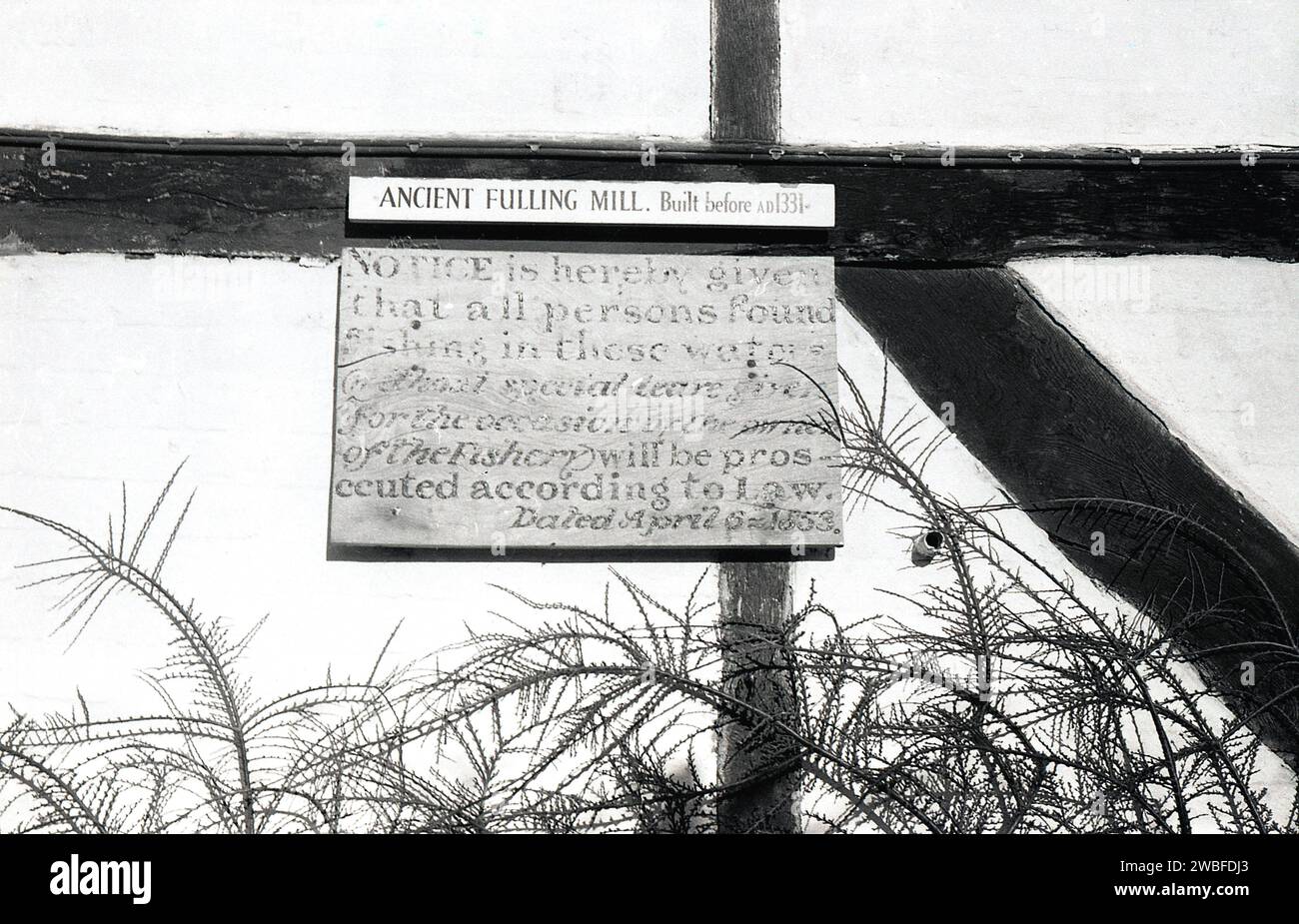 1960s, historical, written on old thatched wooden frame building at ...