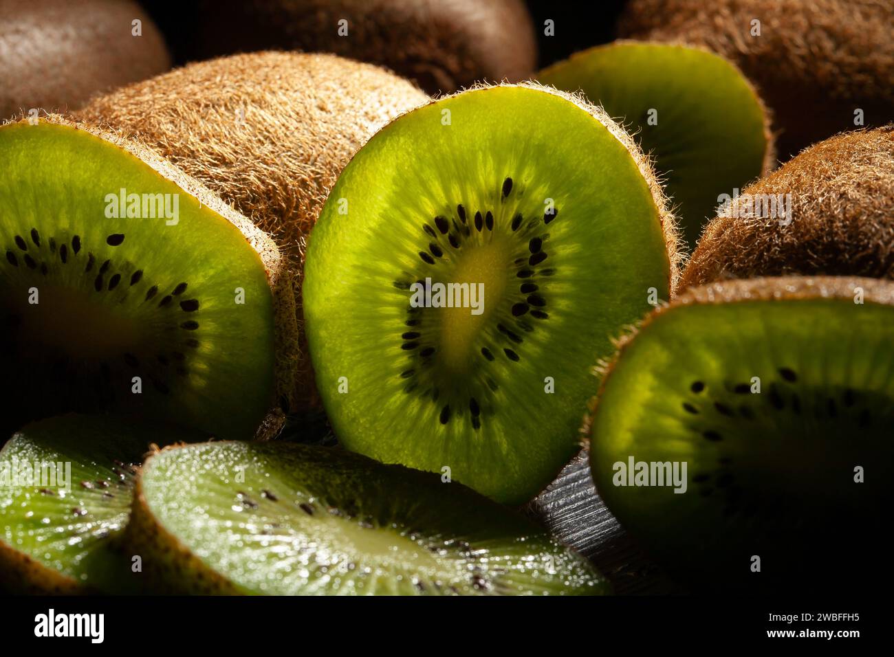 Kiwi fruit slices backlit hi-res stock photography and images - Alamy