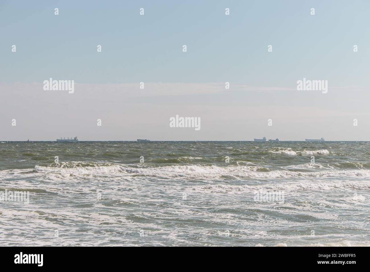 Trade ships on horizon in Black Sea, Ukraine. Freighter ships going to ...