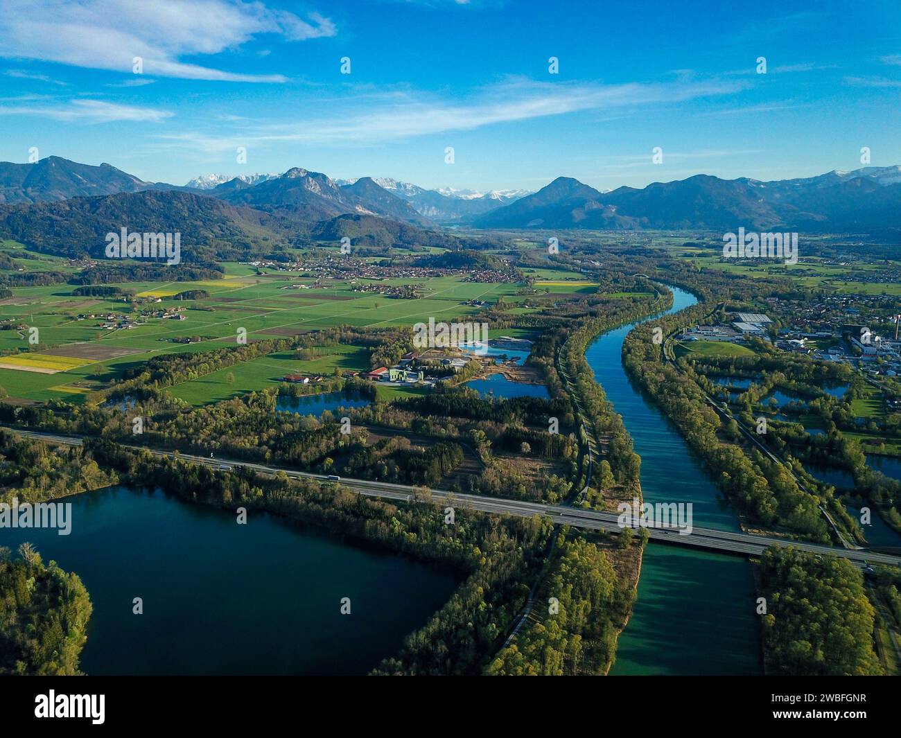 Looking across the river Inn at the Austrian alps Stock Photo - Alamy