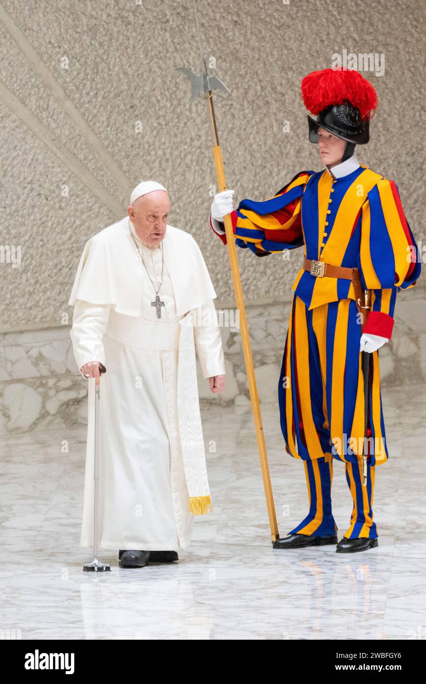 Pope Francis walks in front of a Pontifical Swiss Guard as he arrives ... Pope Francis walks in front of a Pontifical Swiss Guard as he arrives ...