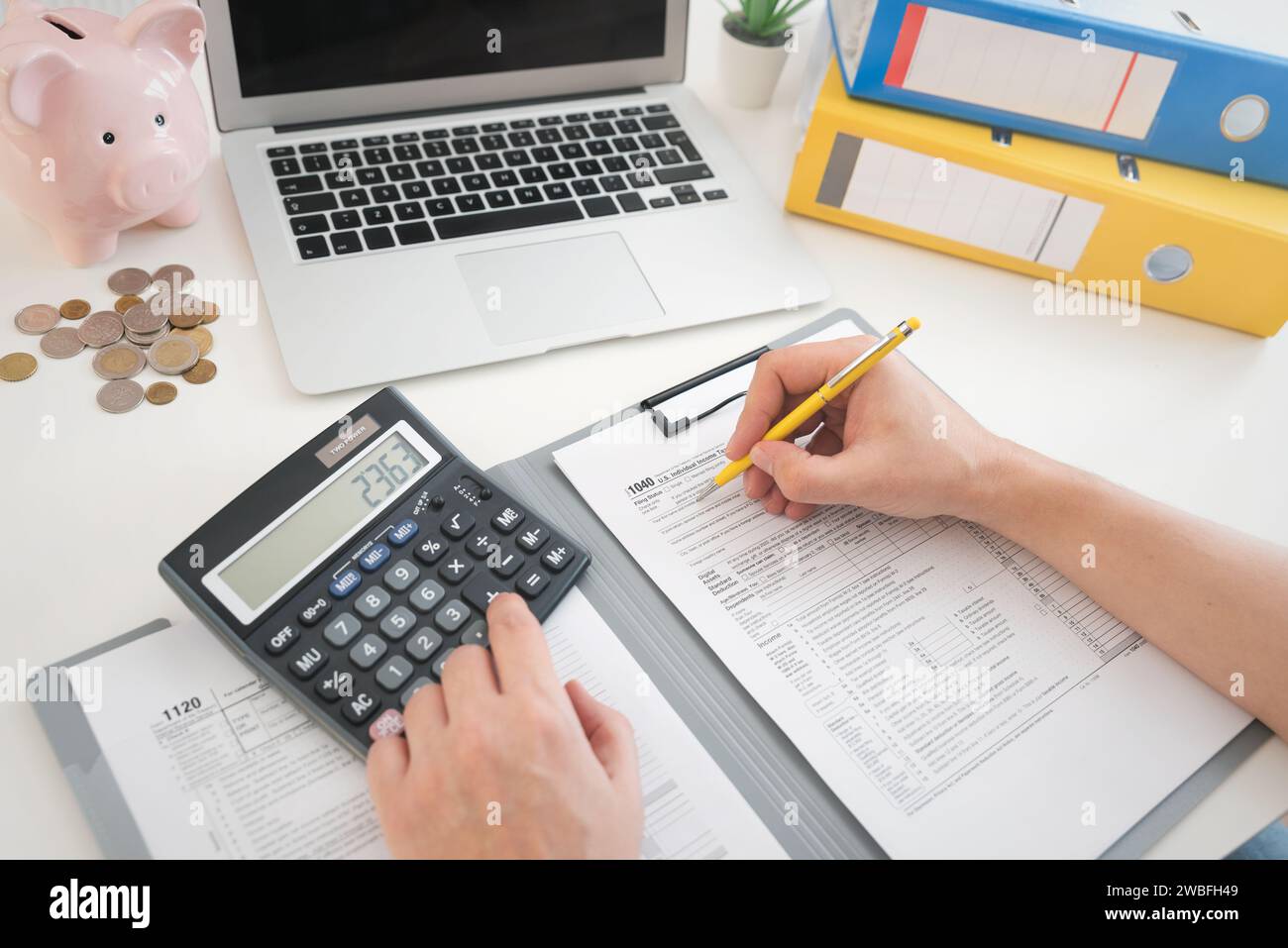 Tax income concept with filling US tax forms on desk Stock Photo - Alamy