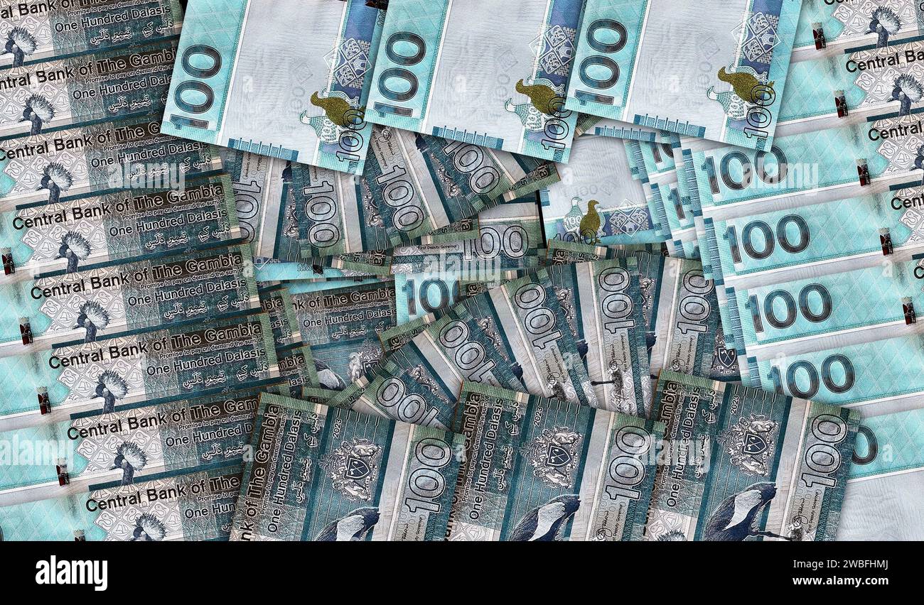 Gambia dalasi banknotes in a cash fan mosaic pattern. Gambian GMD 100 ...