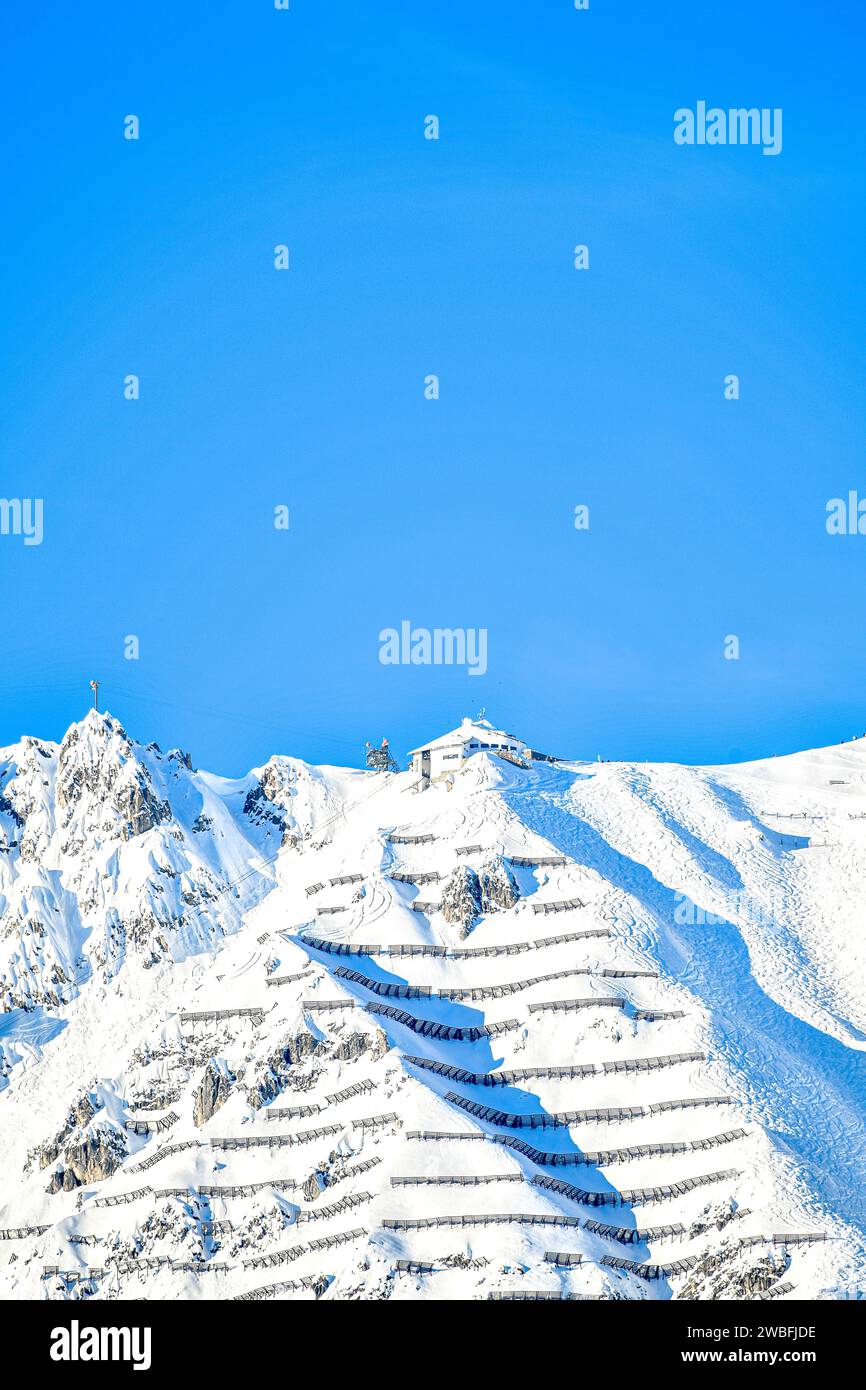 The snowy peaks of the mountains around Innsbruck can be reached by ...