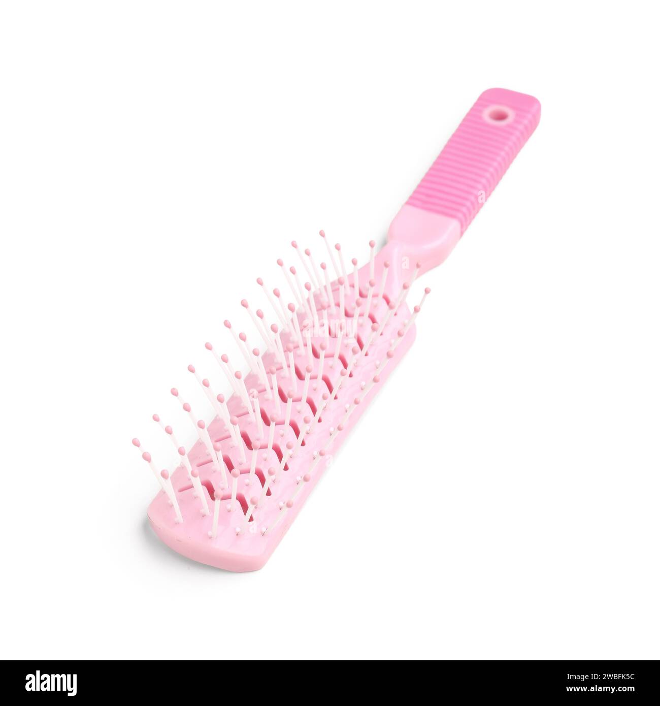 Pink hair brush on white background Stock Photo - Alamy