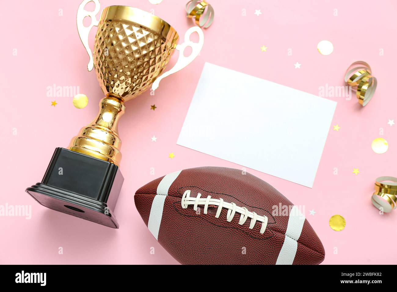 Blank card with gold cup, rugby ball and confetti on pink background ...
